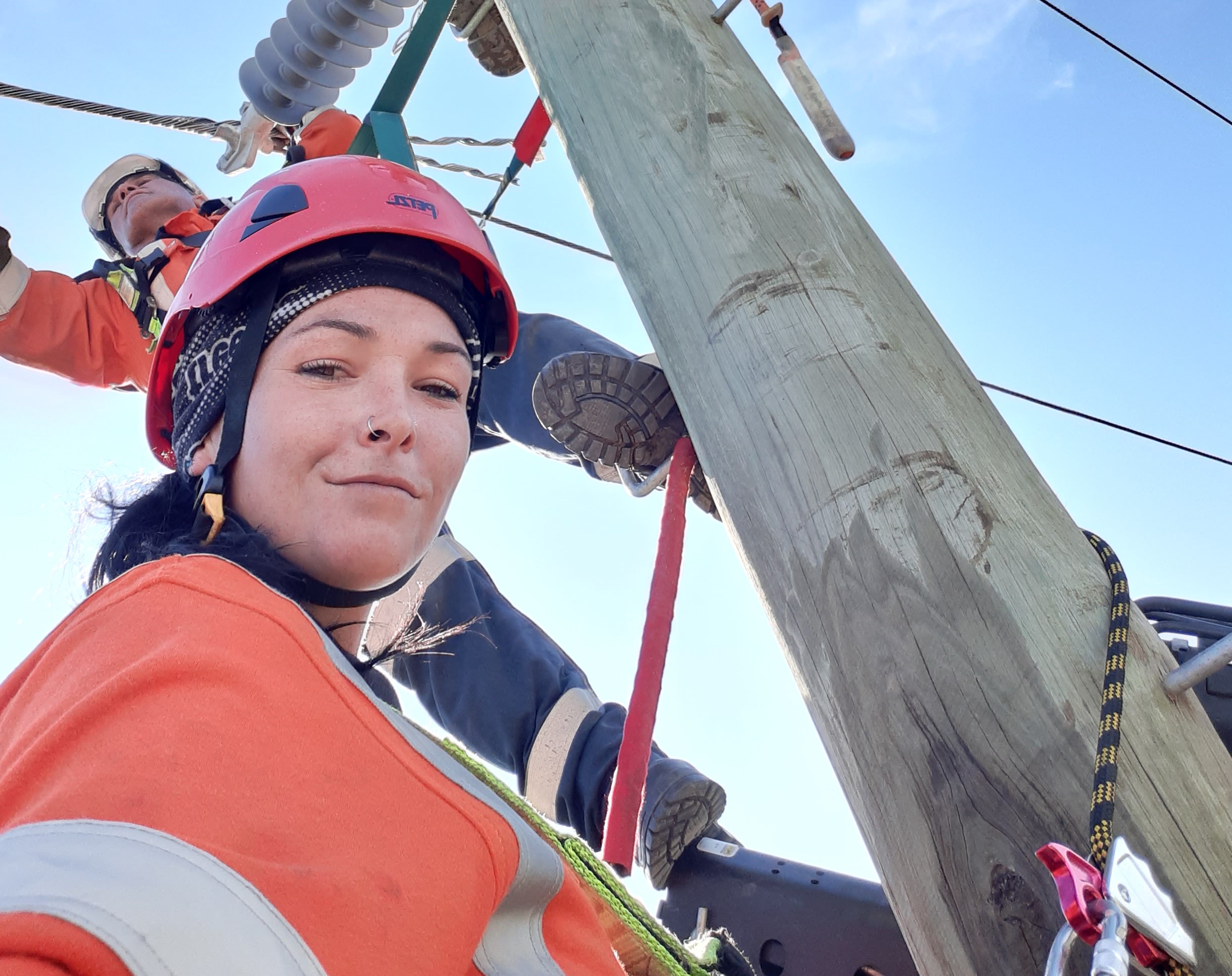 Alana - the woman who's happiest perched on the top of a power pole at ...